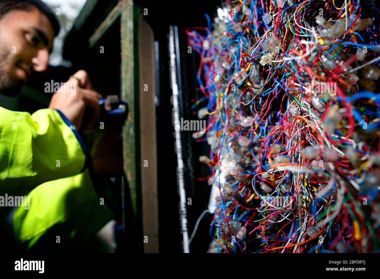 A BT enigineer fixng phone lines in North London Stock Photo - Alamy
