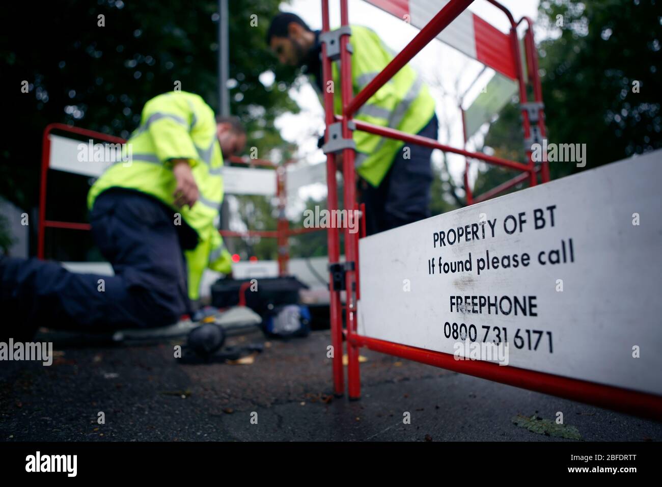 A BT enigineer fixng phone lines in North London Stock Photo - Alamy