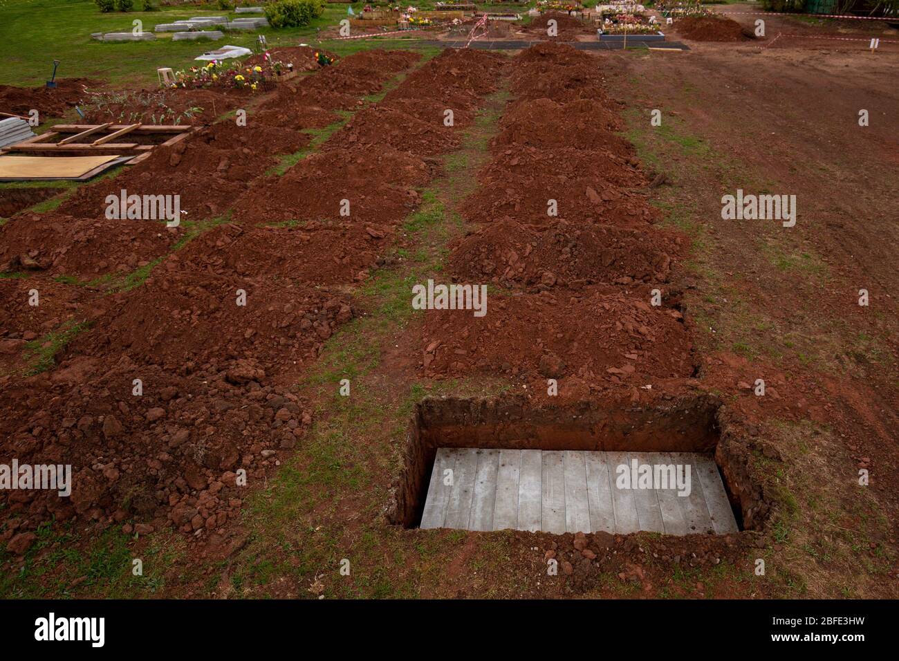 Rows of new graves being prepared at high wood cemetery hi-res stock ...
