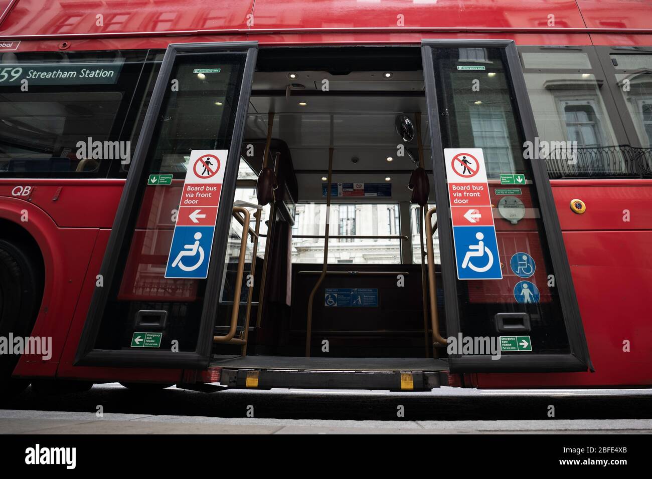 The middle doors of a London bus is seen in Westminster as from Monday ...