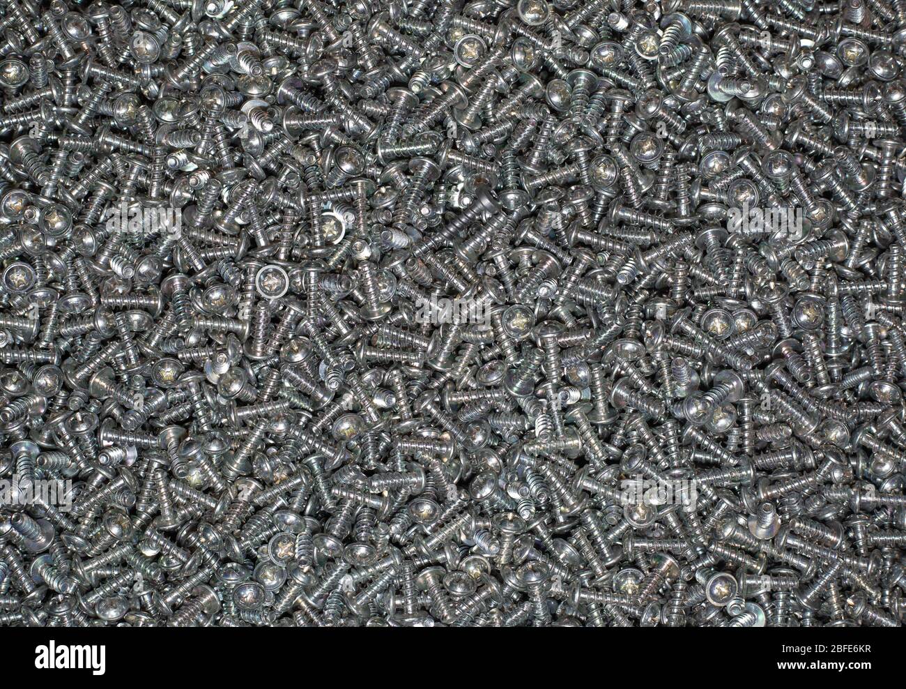 A huge arrenge of taping metal or iron screws, screws background ...