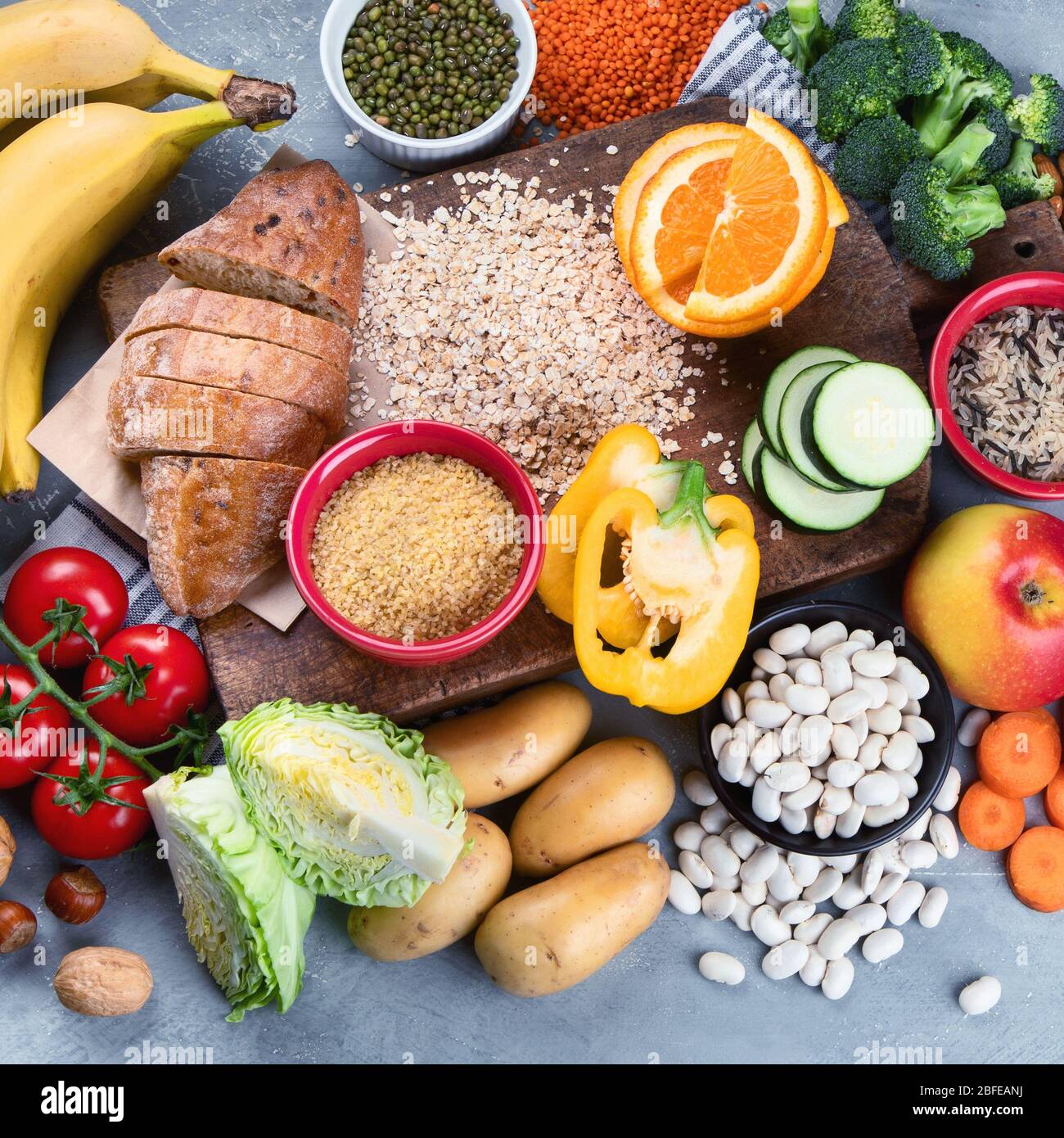 Foods high in carbohydrates on grey background. Vegan Foods high in ...