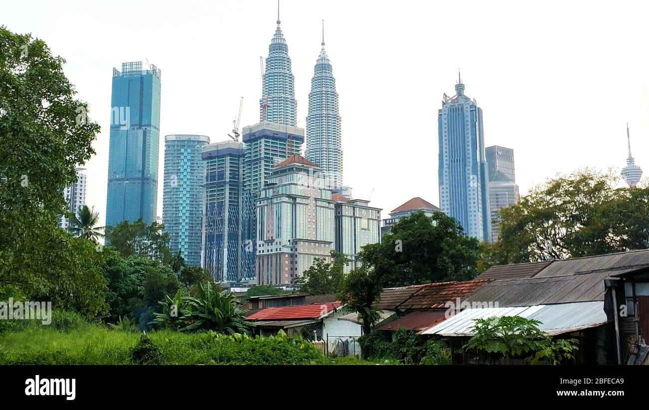 Kuala lumpur cityscape with famous Petronas twin towers Stock Photo - Alamy