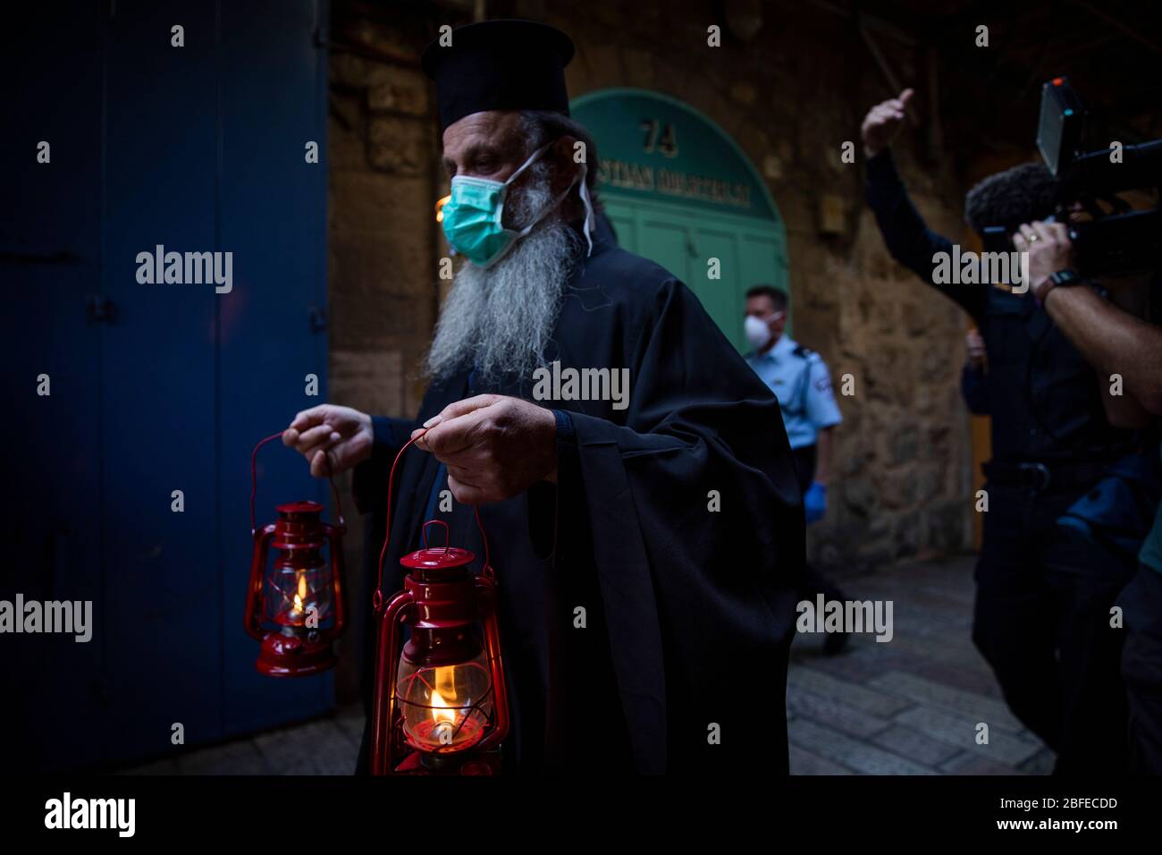 Jerusalem, Israel. 18th Apr, 2020. A Greek Orthodox priest wearing a ...
