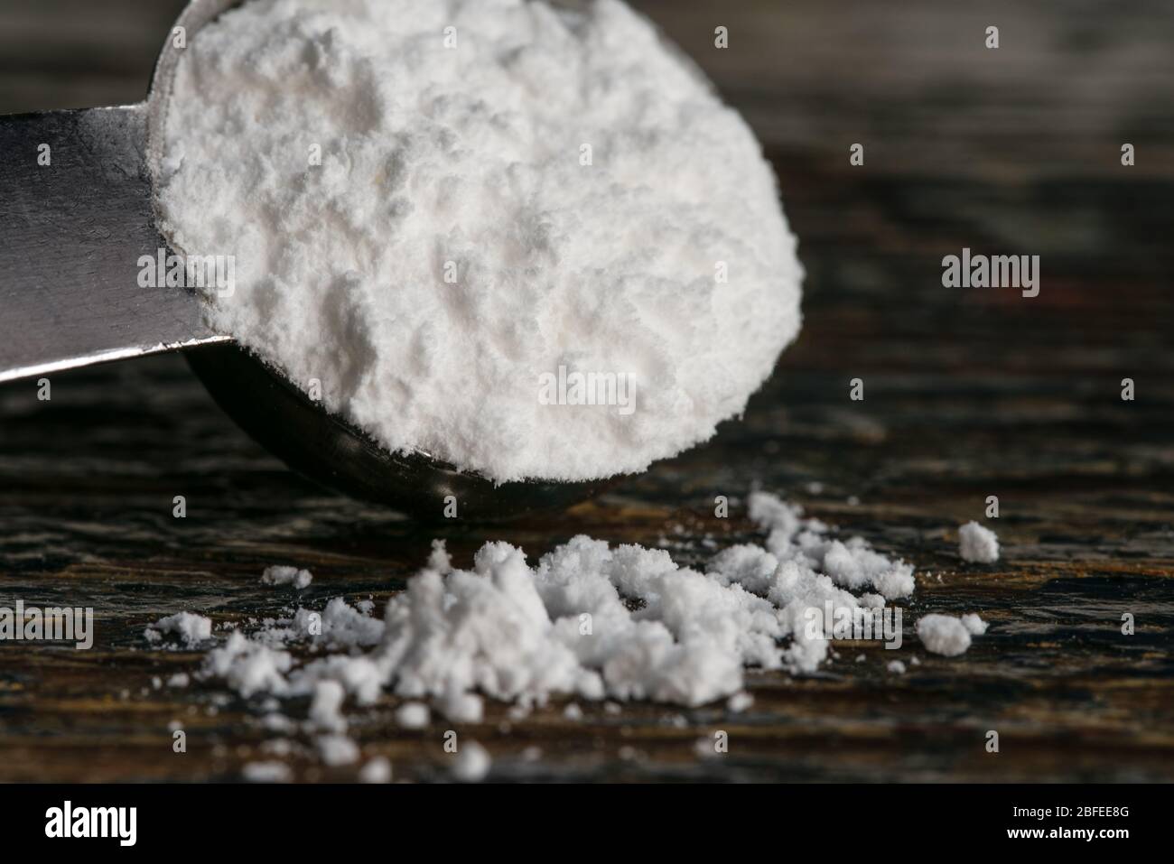 Powdered Sugar Spilled from a Teaspoon Stock Photo - Alamy