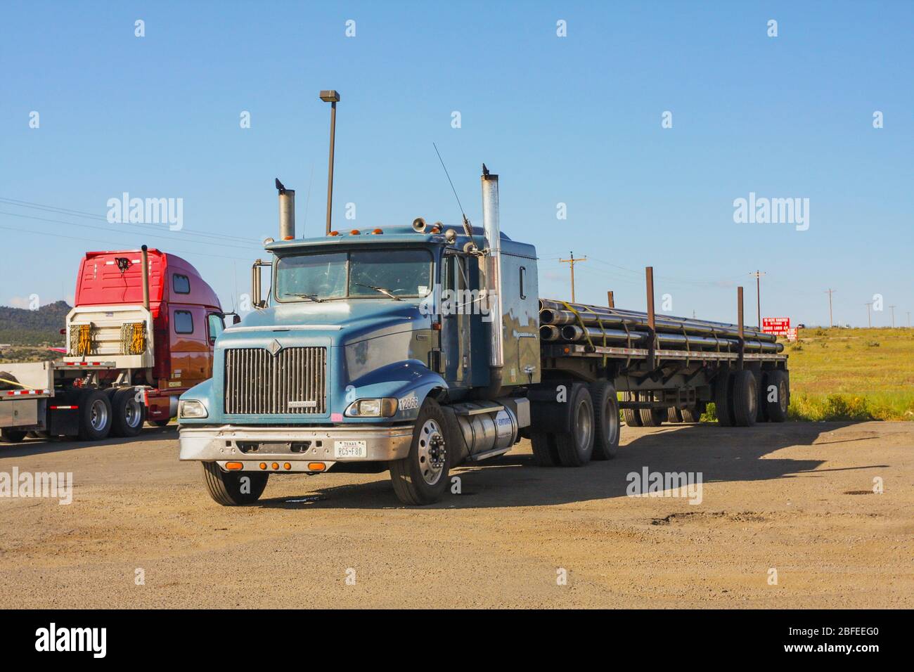 Truck carrying pipes hi-res stock photography and images - Alamy