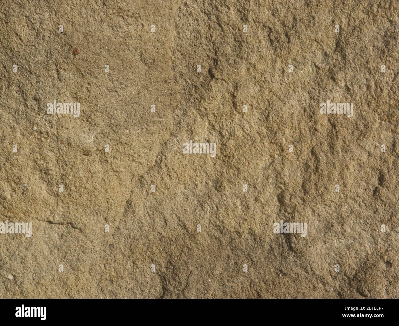 Orange stone texture picture with reliefs in macro to highlight ...