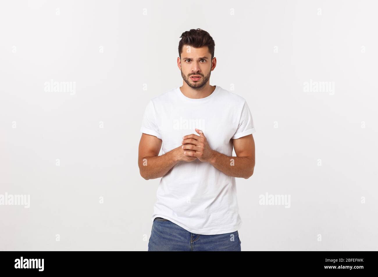 Serious bossy or businessman with looking at camera. Isolated on white ...