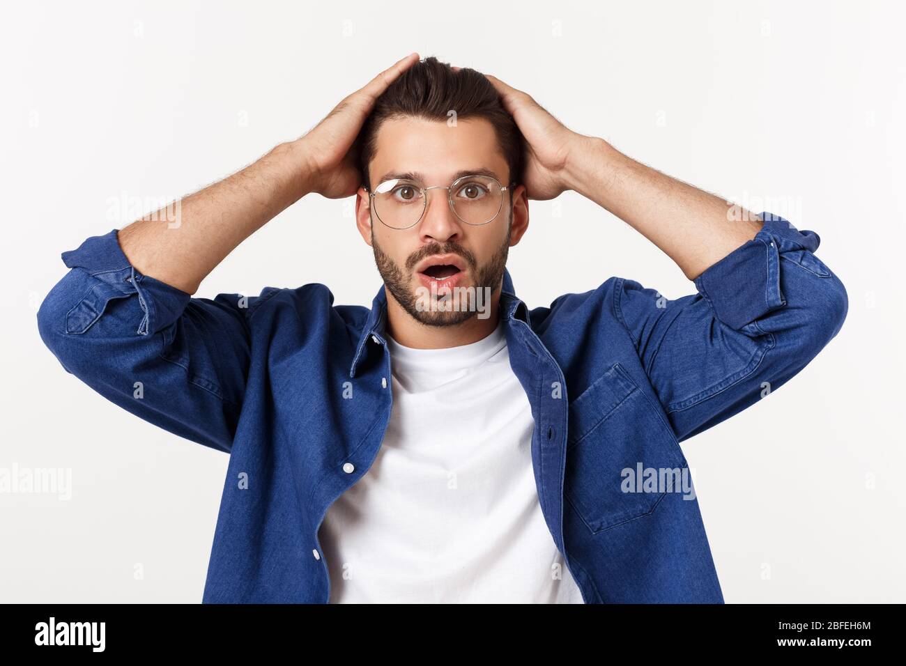 Serious bossy or businessman with looking at camera. Isolated on white ...