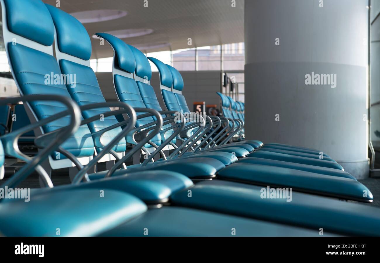 contemporary blue lounge with seats in the airport Stock Photo - Alamy