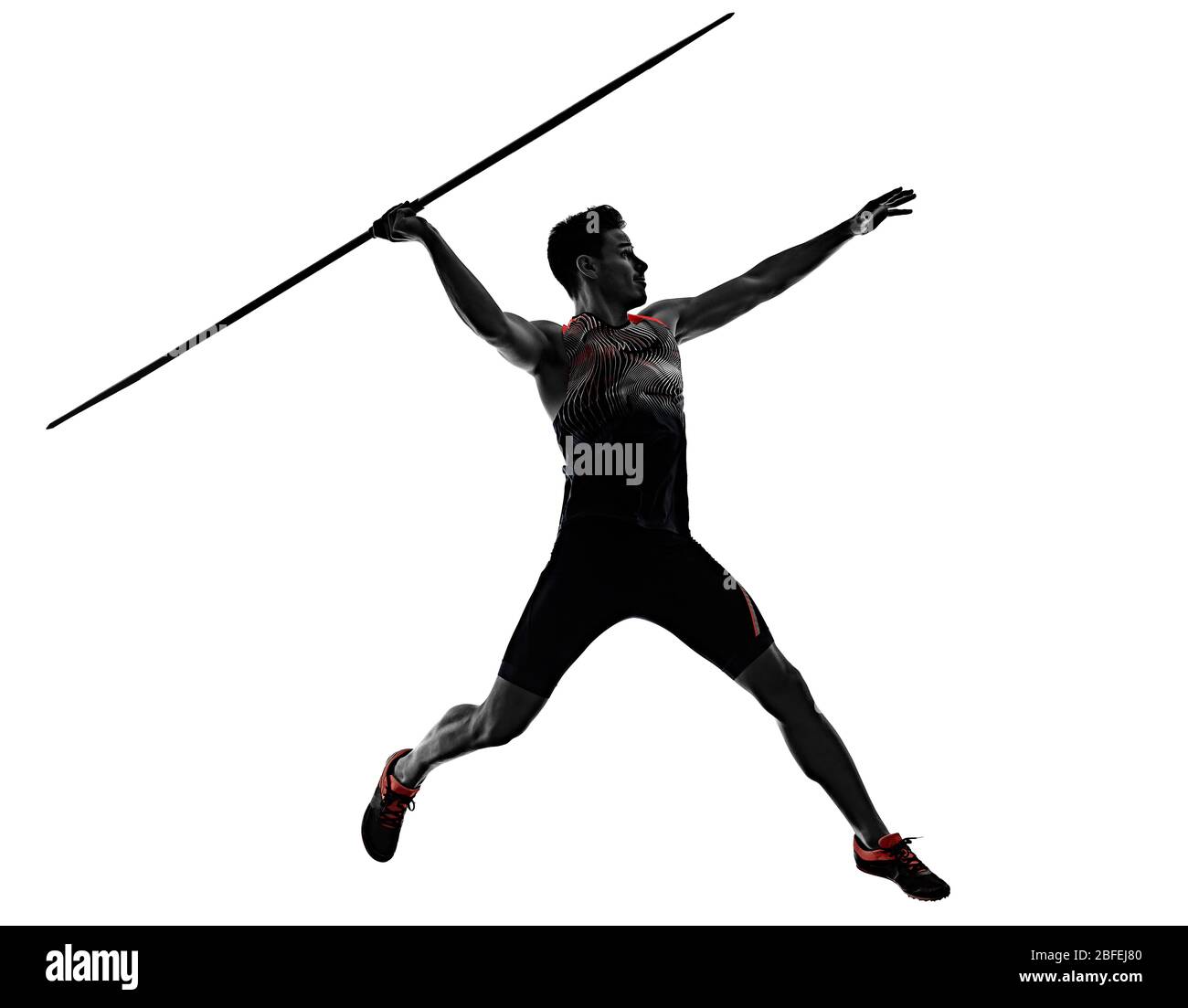 one young caucasian athlete man practicing Javelin athletics in studio ...