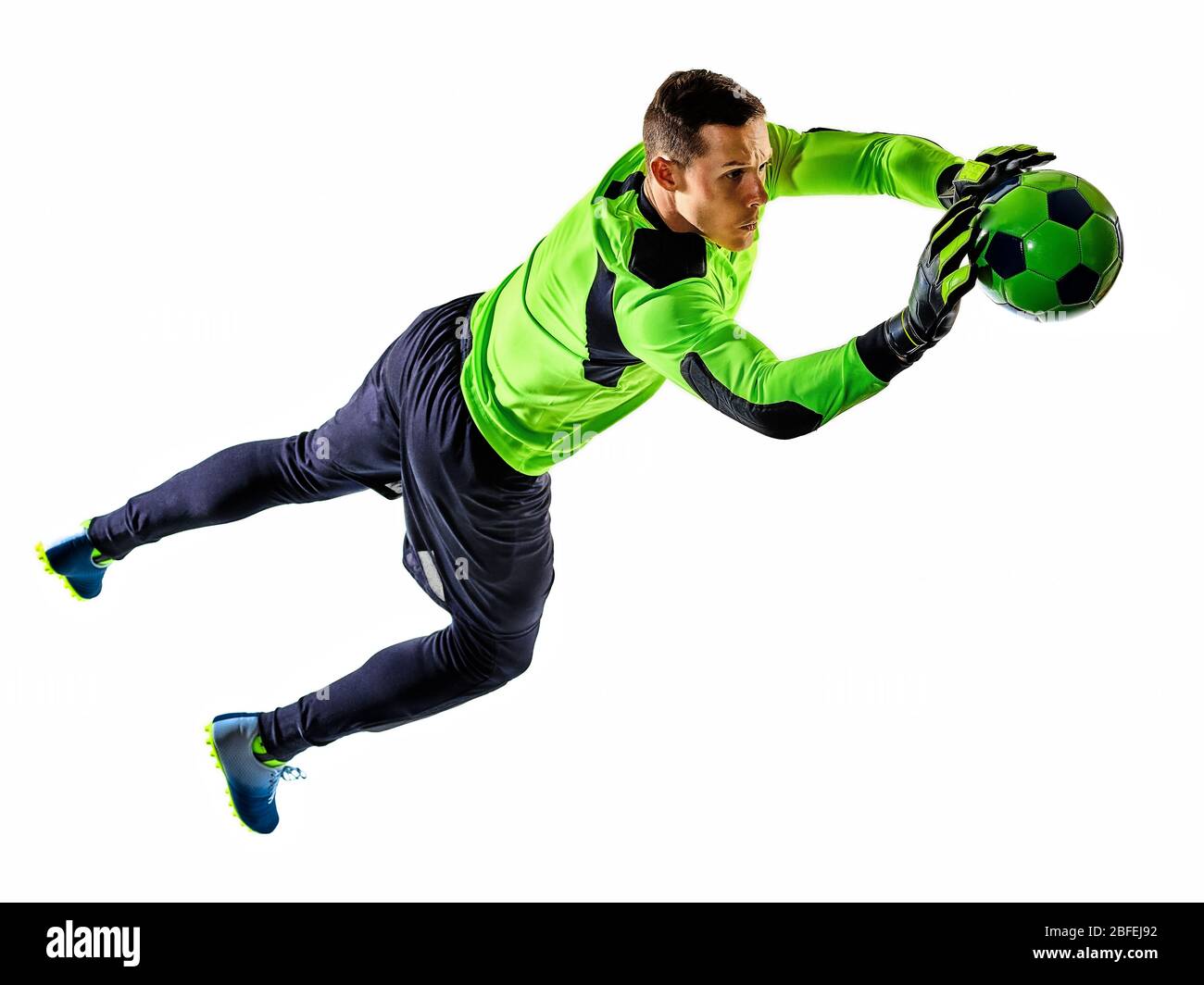 one caucasian soccer player goalkeeper man in studio silhouette shadow ...