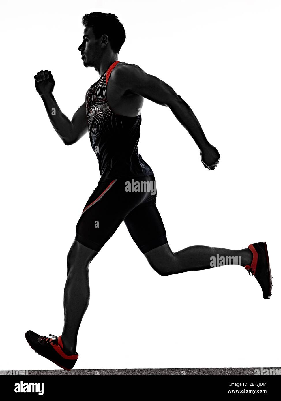 one young caucasian man practicing athletics runner running sprinter ...