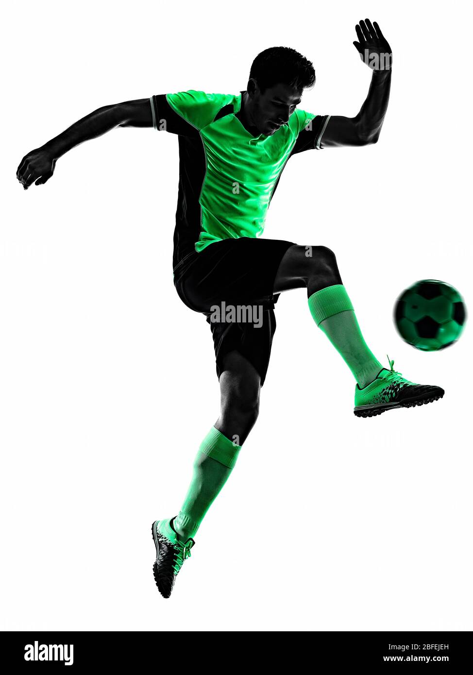 one young caucasian soccer player silhouette shadow in studio isolated ...