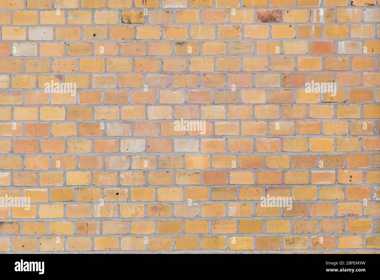 Beige or yellow dutch clinker wall texture small old stones Stock Photo ...