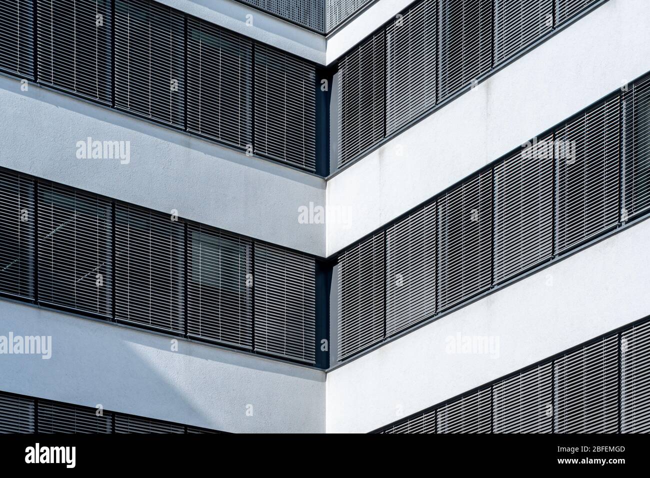 Modern facade front of modern business office building with dark window ...