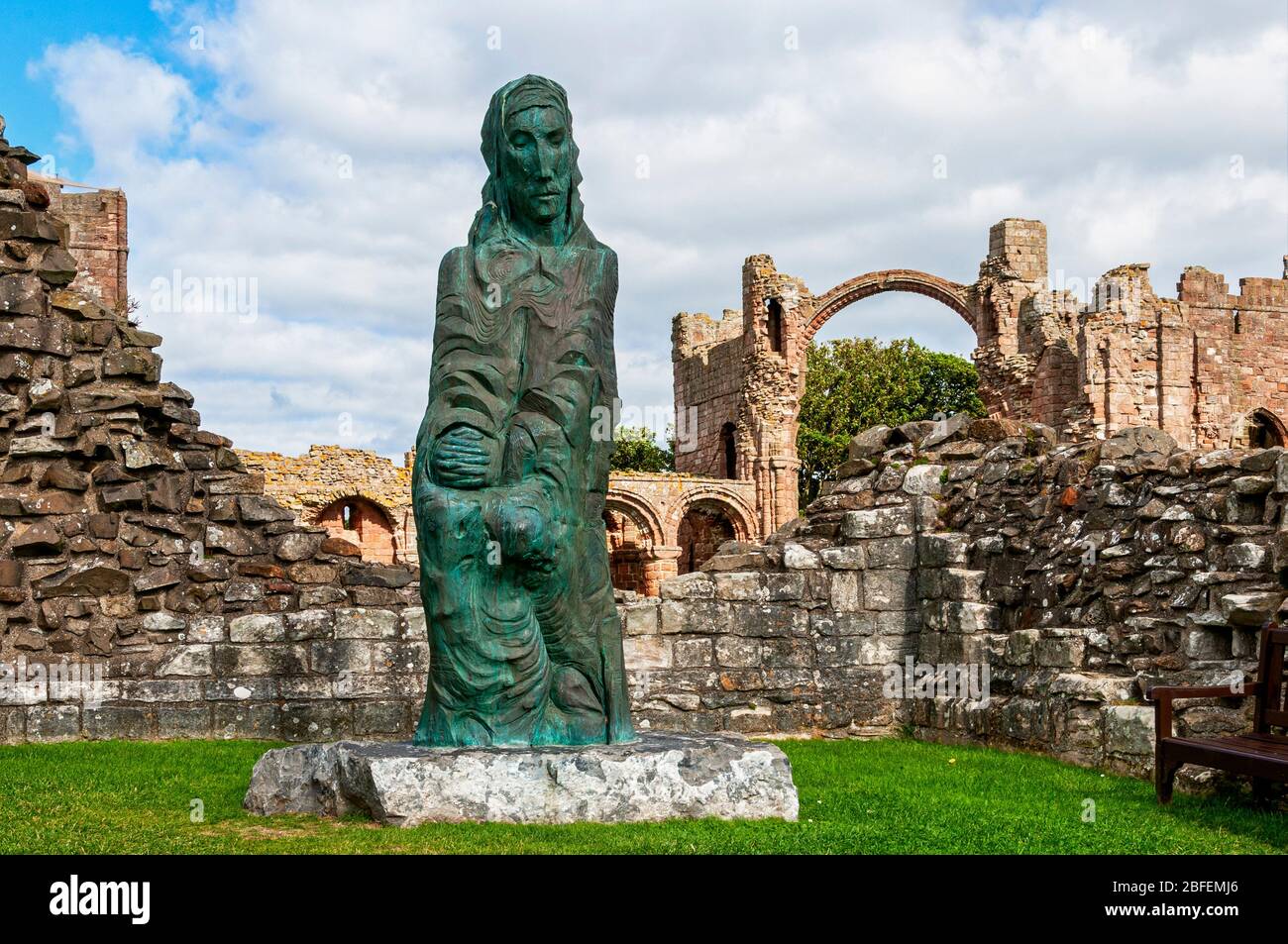 A bronze statue of St Cuthbert sculpted by Fenwick Lawson is situated ...