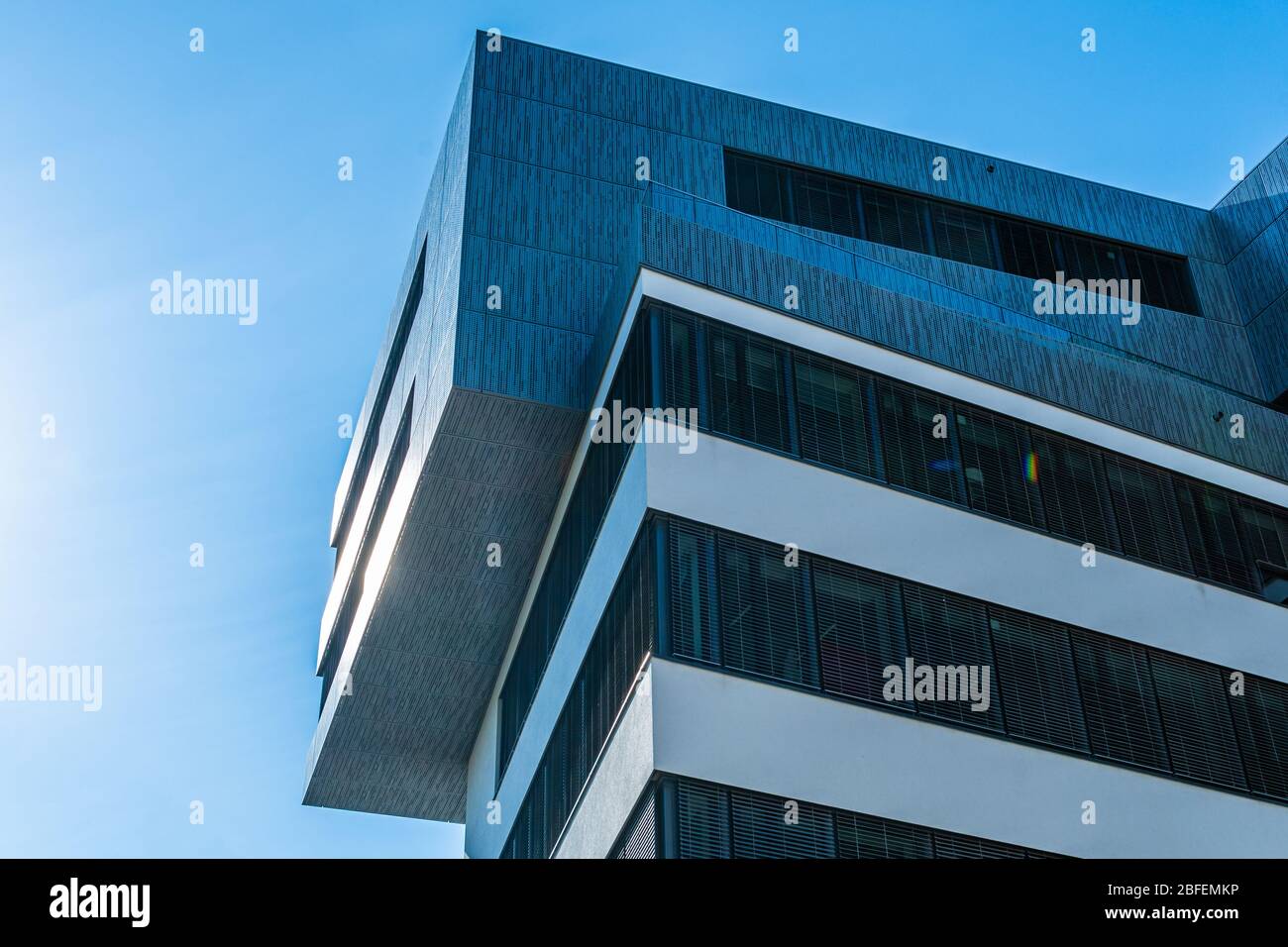 Modern facade front of modern business office building with a shifted ...