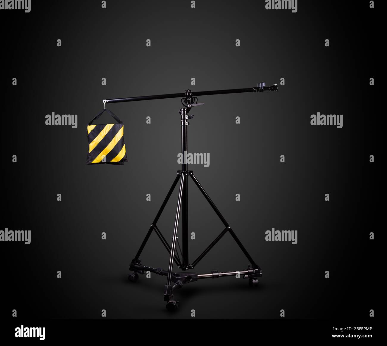 Photo studio lighting stands isolated on the black background Stock ...