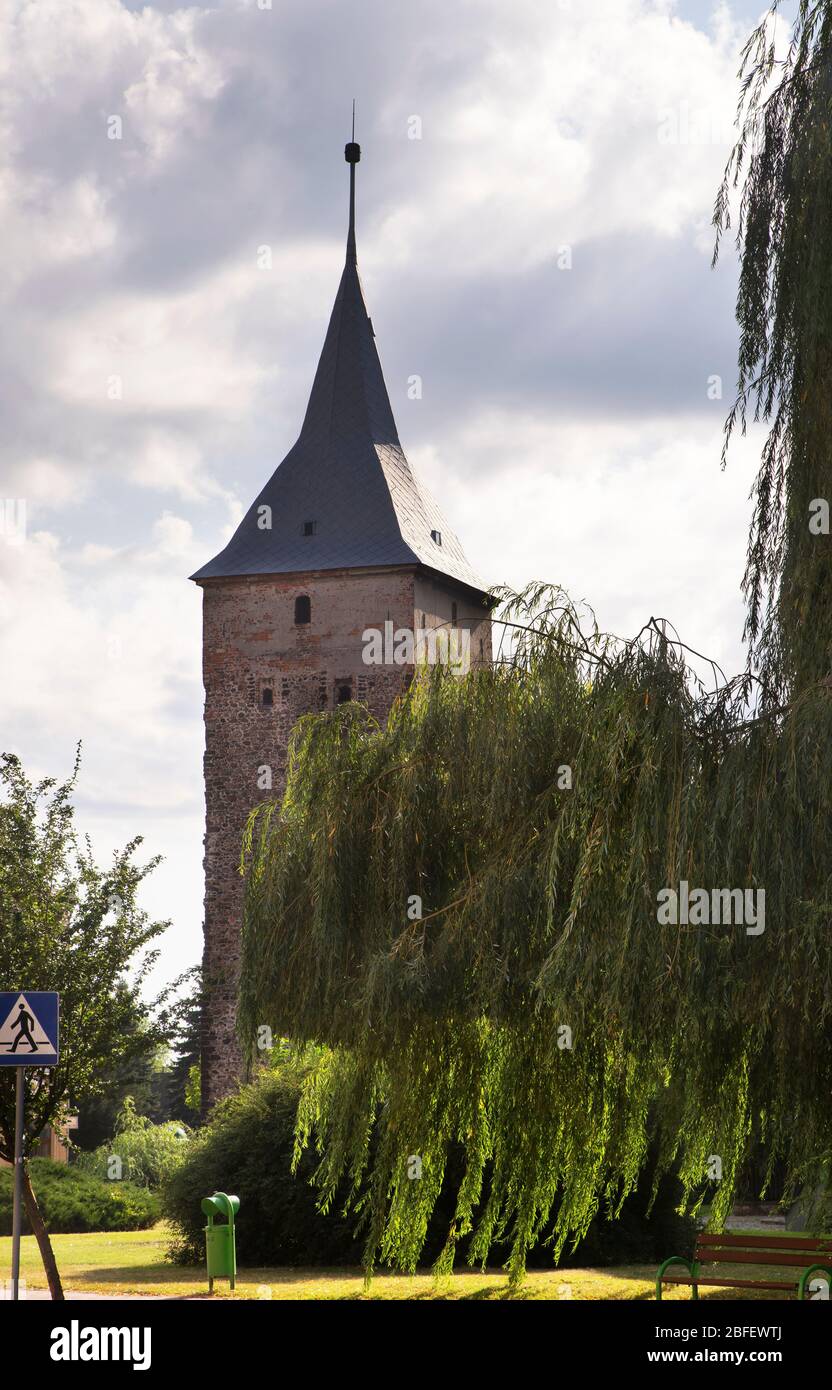Guard tower and church of Holiest Heart of Jesus in Zary. Poland Stock ...