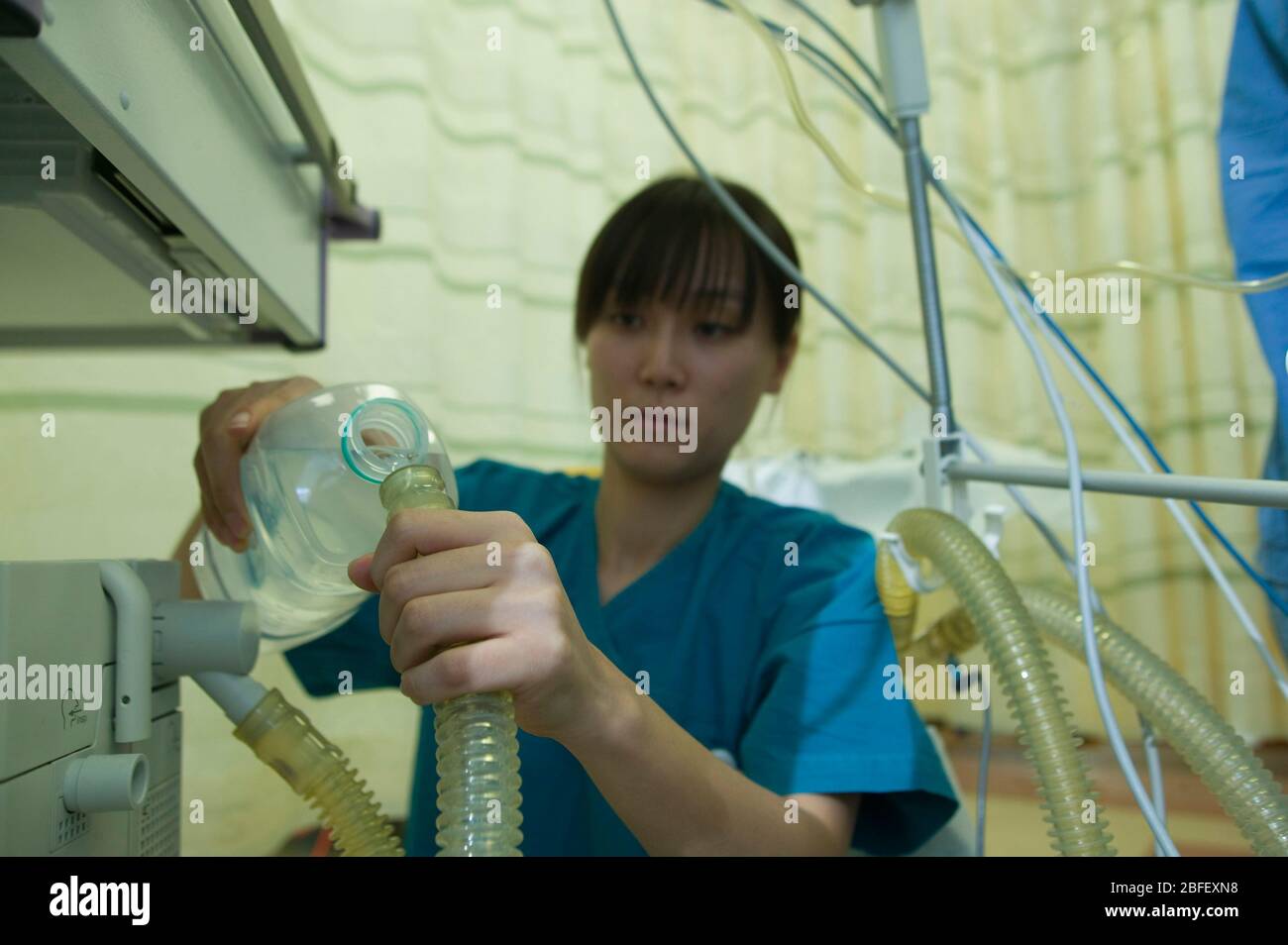The anaesthetists administers general anaesthetic gasfor patient use ...