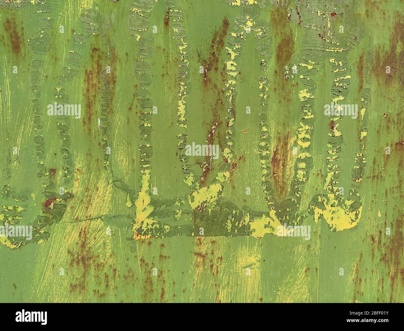 Corroded metal background. Rusted green and yellow painted metal wall ...