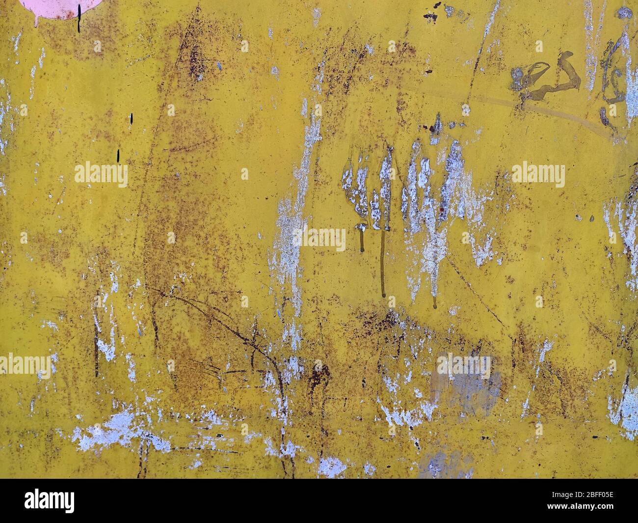 Corroded metal background. Rusted yellow painted metal wall. Rusty ...