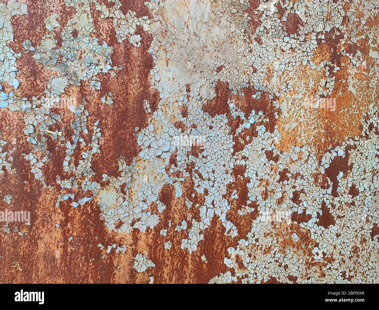Rusted grey painted metal wall. Rusty metal background with streaks of ...
