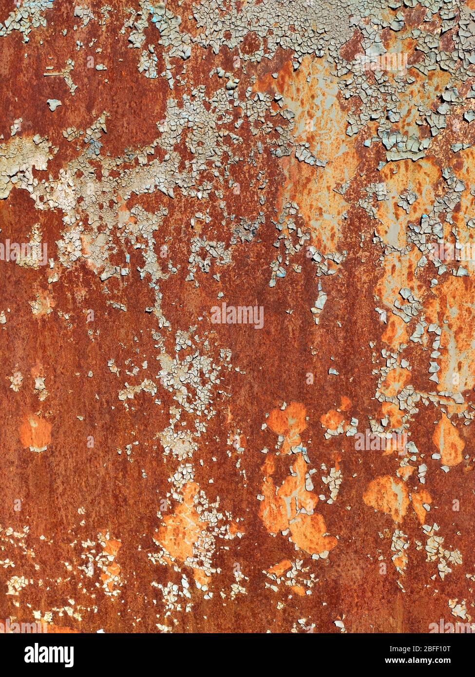 Rusted grey painted metal wall. Rusty metal background with streaks of ...