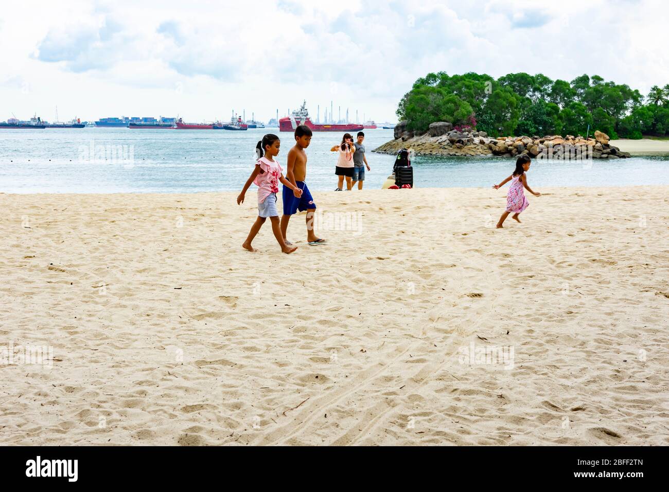 Siloso Sentosa Beach with White sand and some kids, Singapore, March 30 ...
