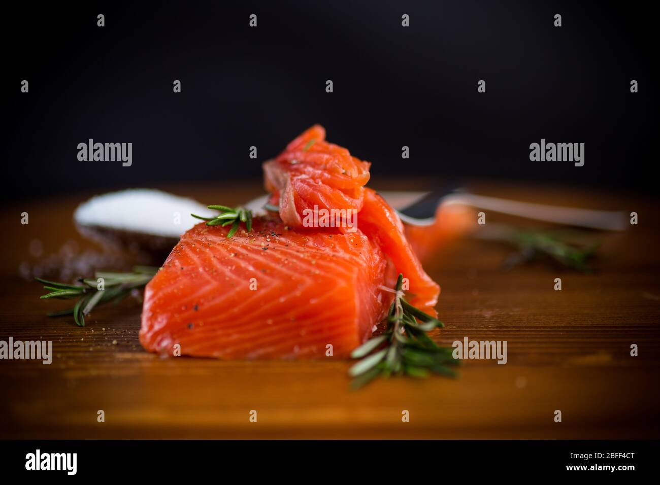Salty red fish on fork hi-res stock photography and images - Alamy