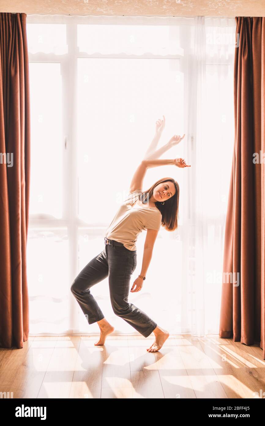 double exposure picture. woman dancing near big window Stock Photo - Alamy