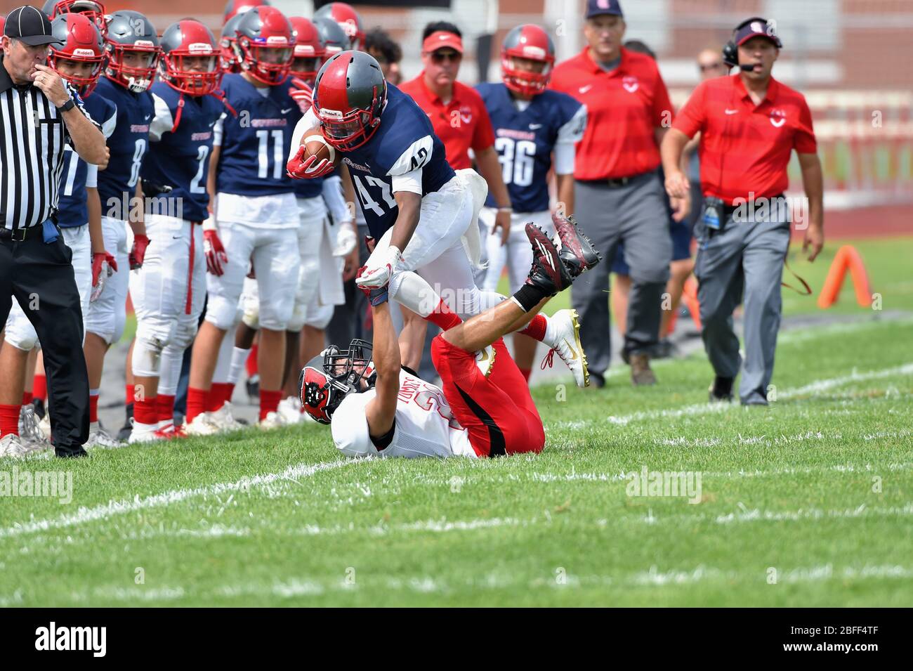 Sport football tackling action concentration hi-res stock photography ...