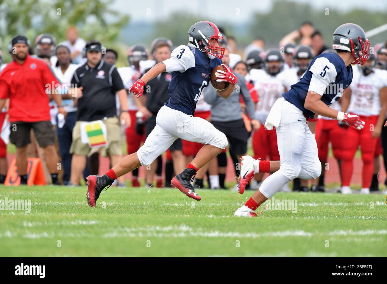 Following a short pass completion, a receiver dashed for a first down ...