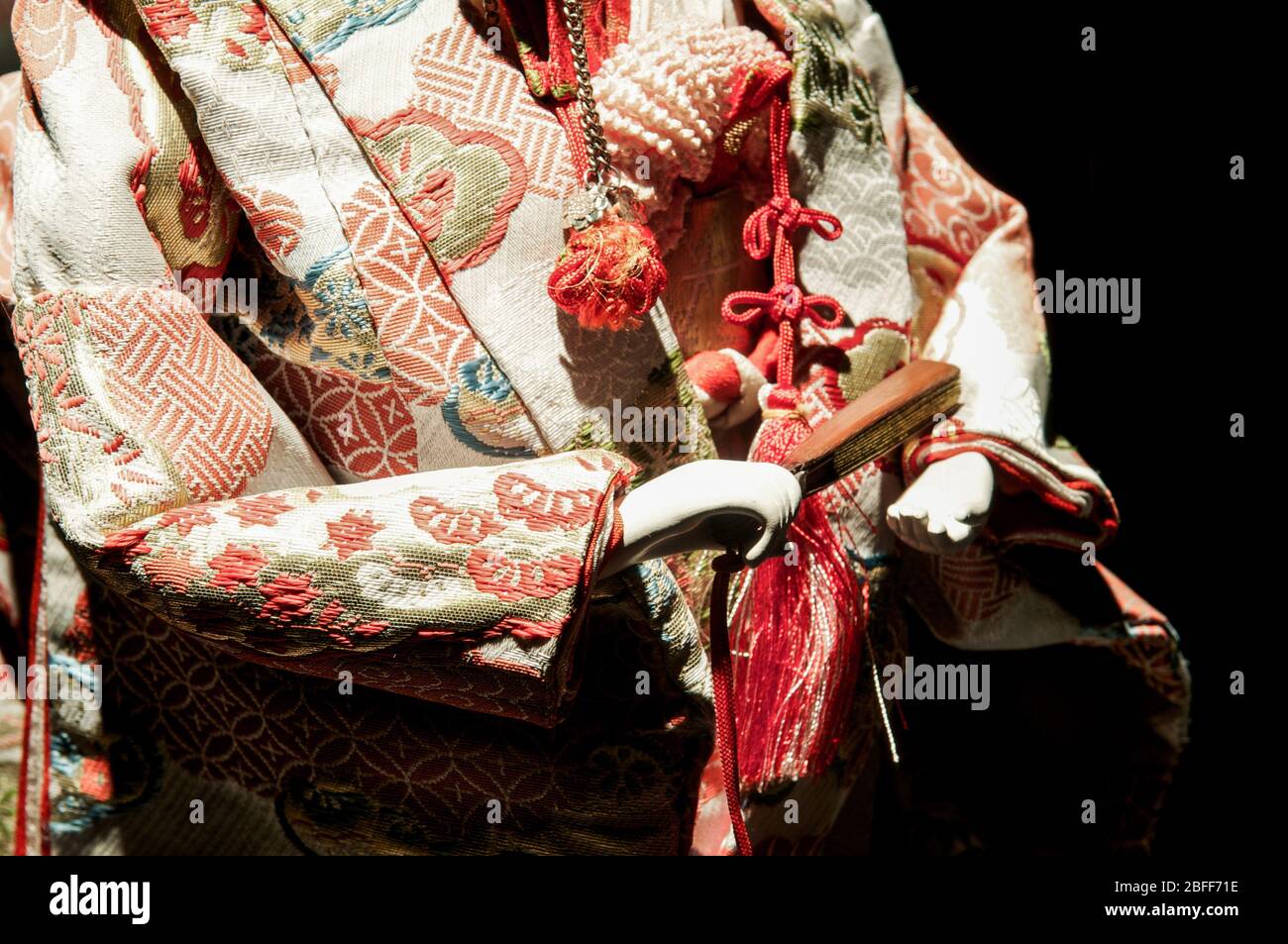 A Japanese NingYo doll, exhibited wearing a traditional costume Stock ...