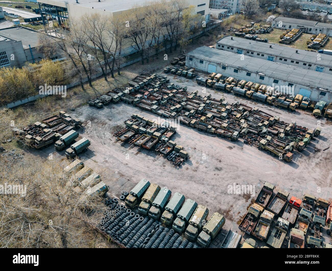 Old rusty broken Russian military cars for scrap metal, aerial view Stock Photo - Alamy