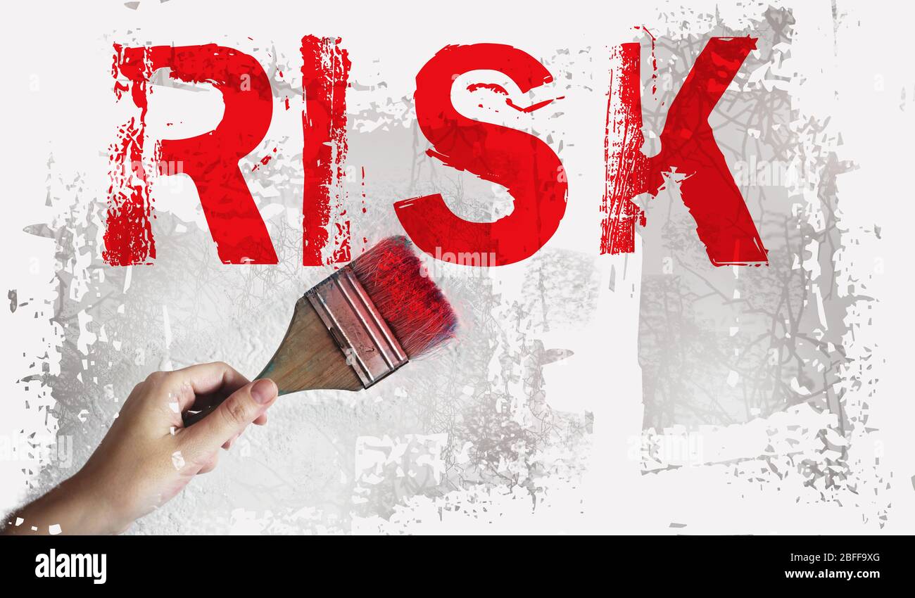 Red word RISK written with paintbrush. Planning, risk management or ...