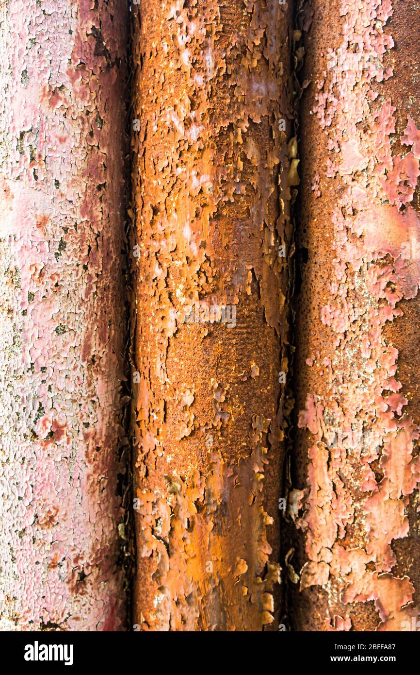 Three corroded rusty metal bars Stock Photo - Alamy