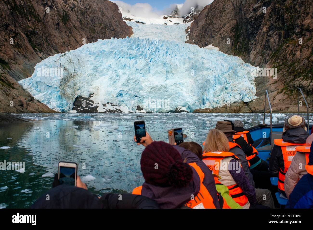 Tourists of Skorpios III cruise at Alsina glacier On The Edge Of The ...
