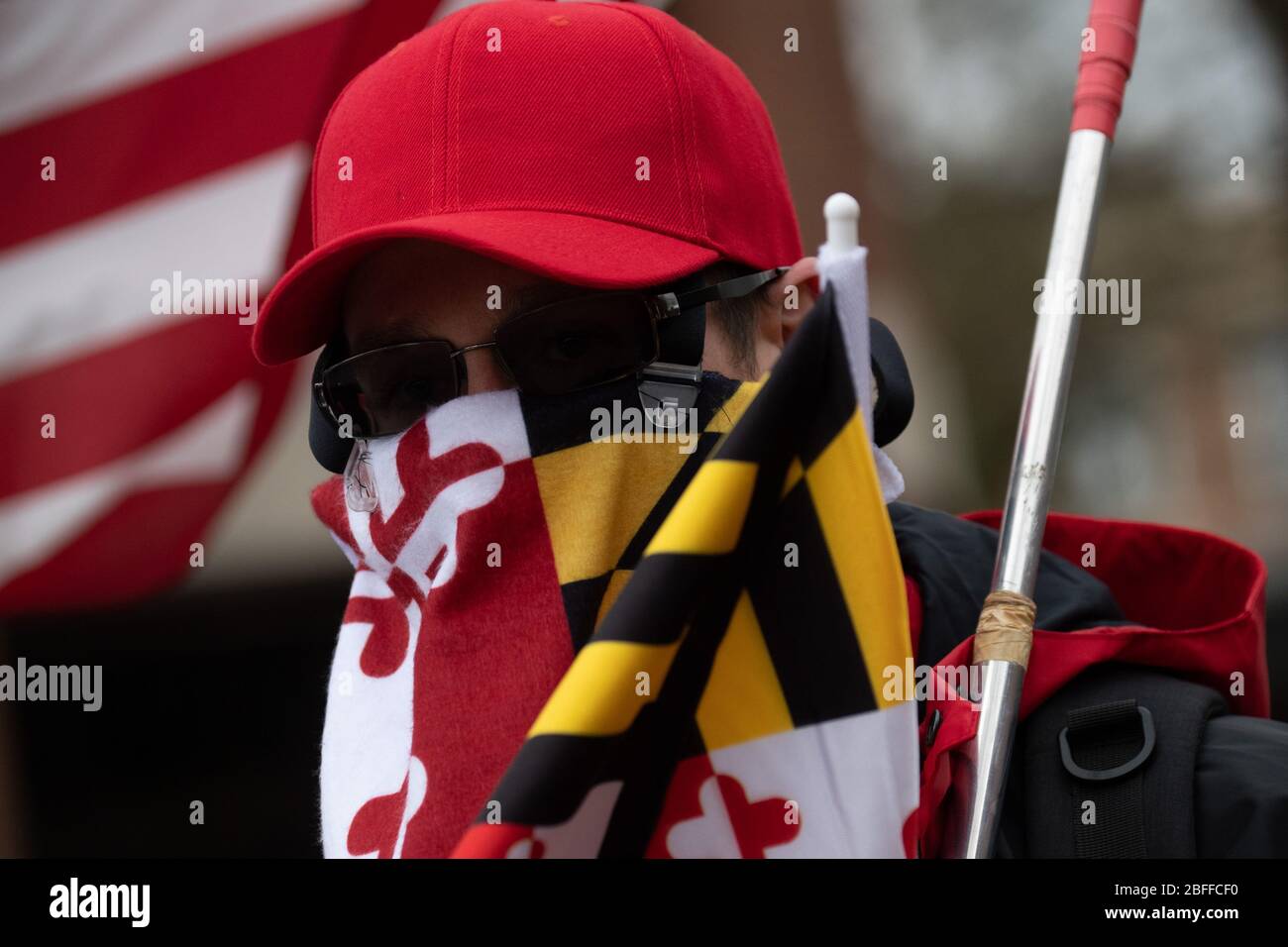 Annapolis, United States. 18th Apr, 2020. A person wears a mask as they ...