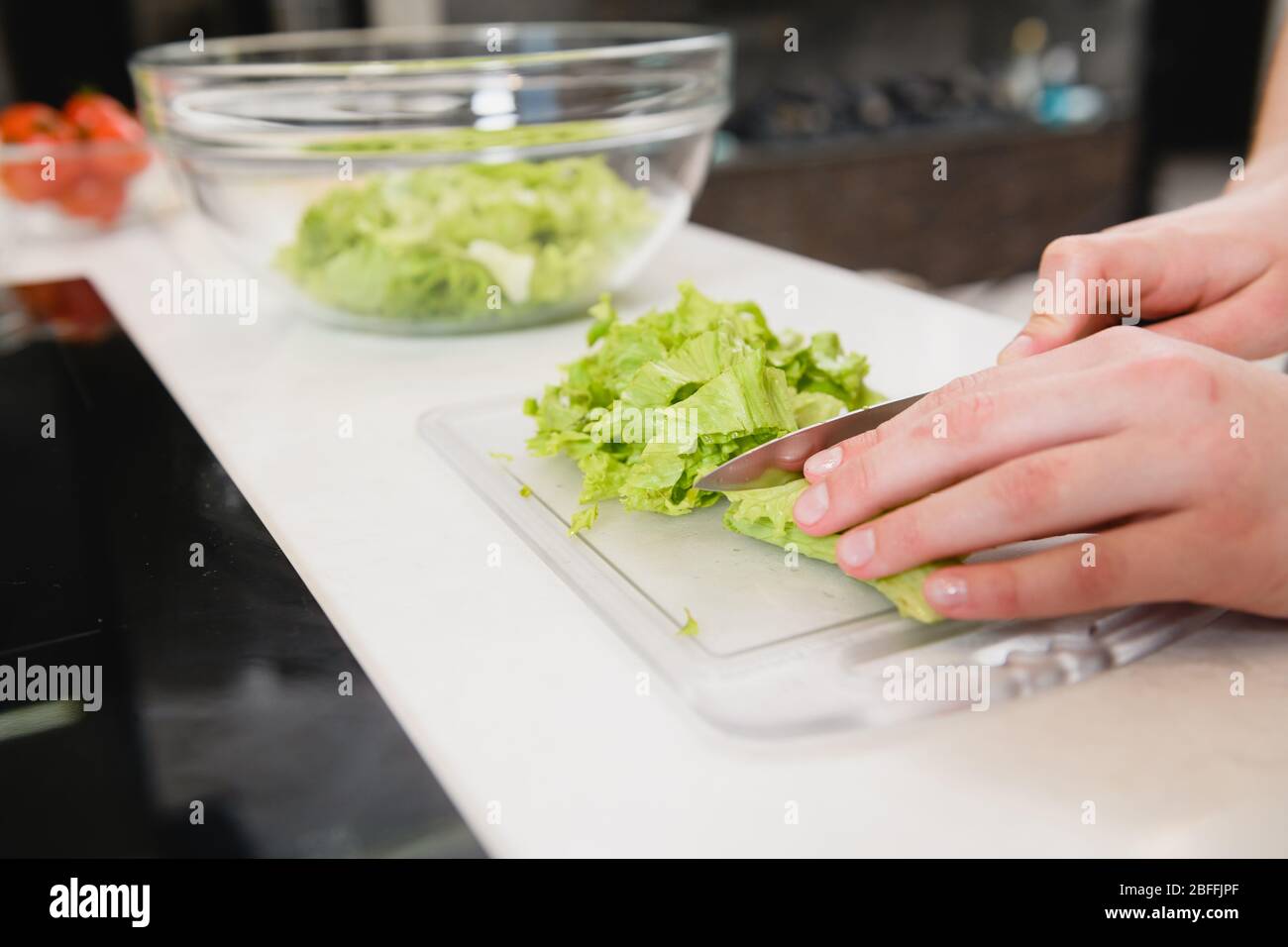 Close up woman cuts green hi-res stock photography and images - Alamy