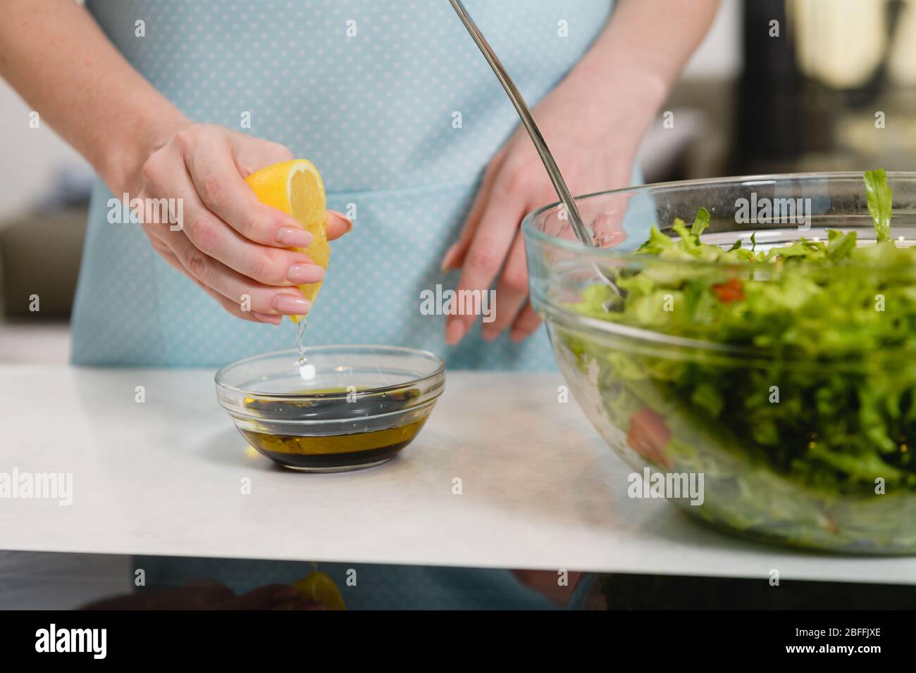 Squeezing lemon juice transparent glass hi-res stock photography and ...