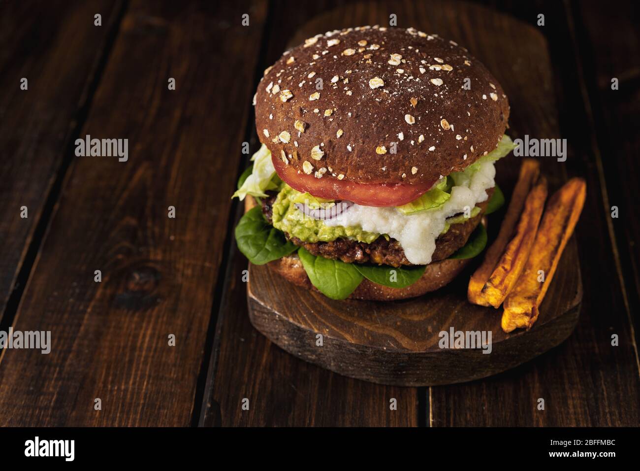 Delicious vegan burger seeing from above on rustic background Stock ...