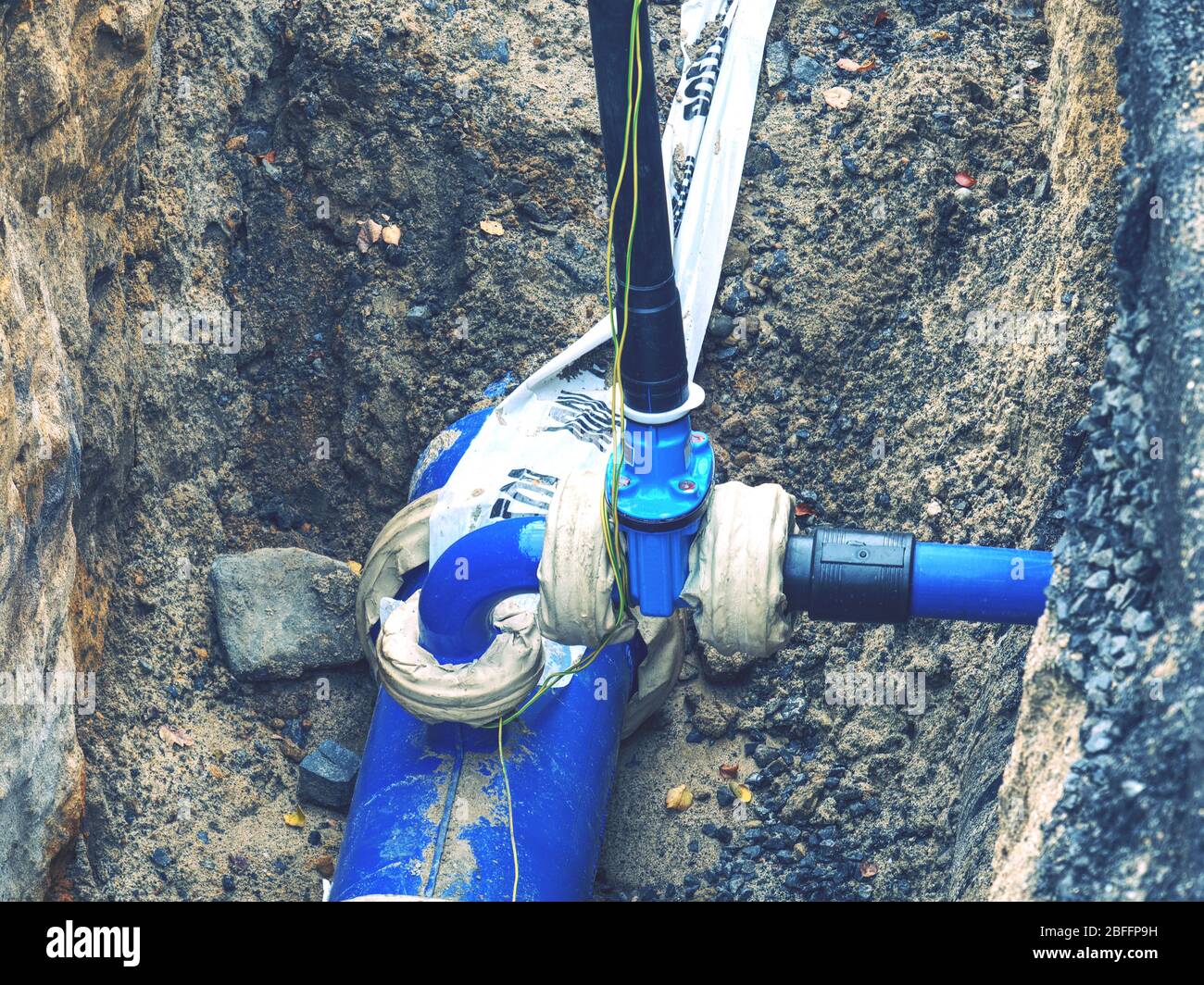 Water pipe repair. City infrastructure reconstruction, building ...