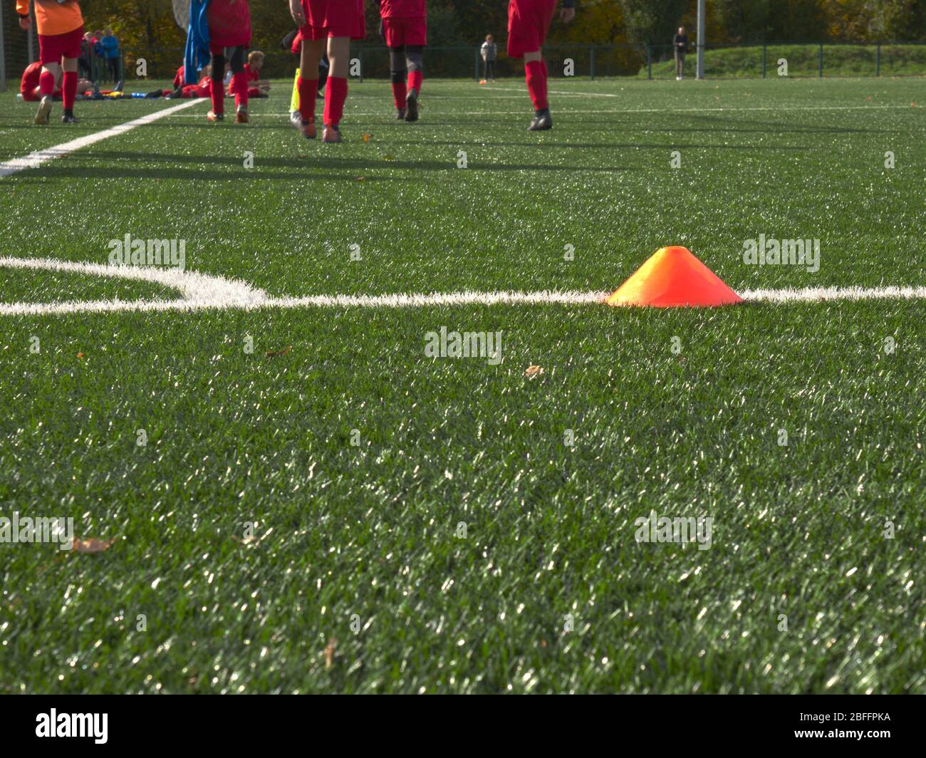Professional sportsperson practicing football grass hi-res stock ...