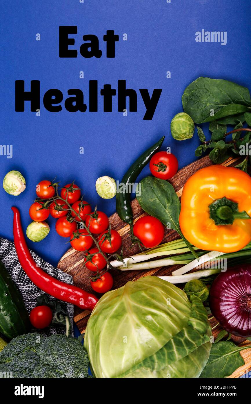 Healthy eating background. Various colorful raw vegetables on blue ...