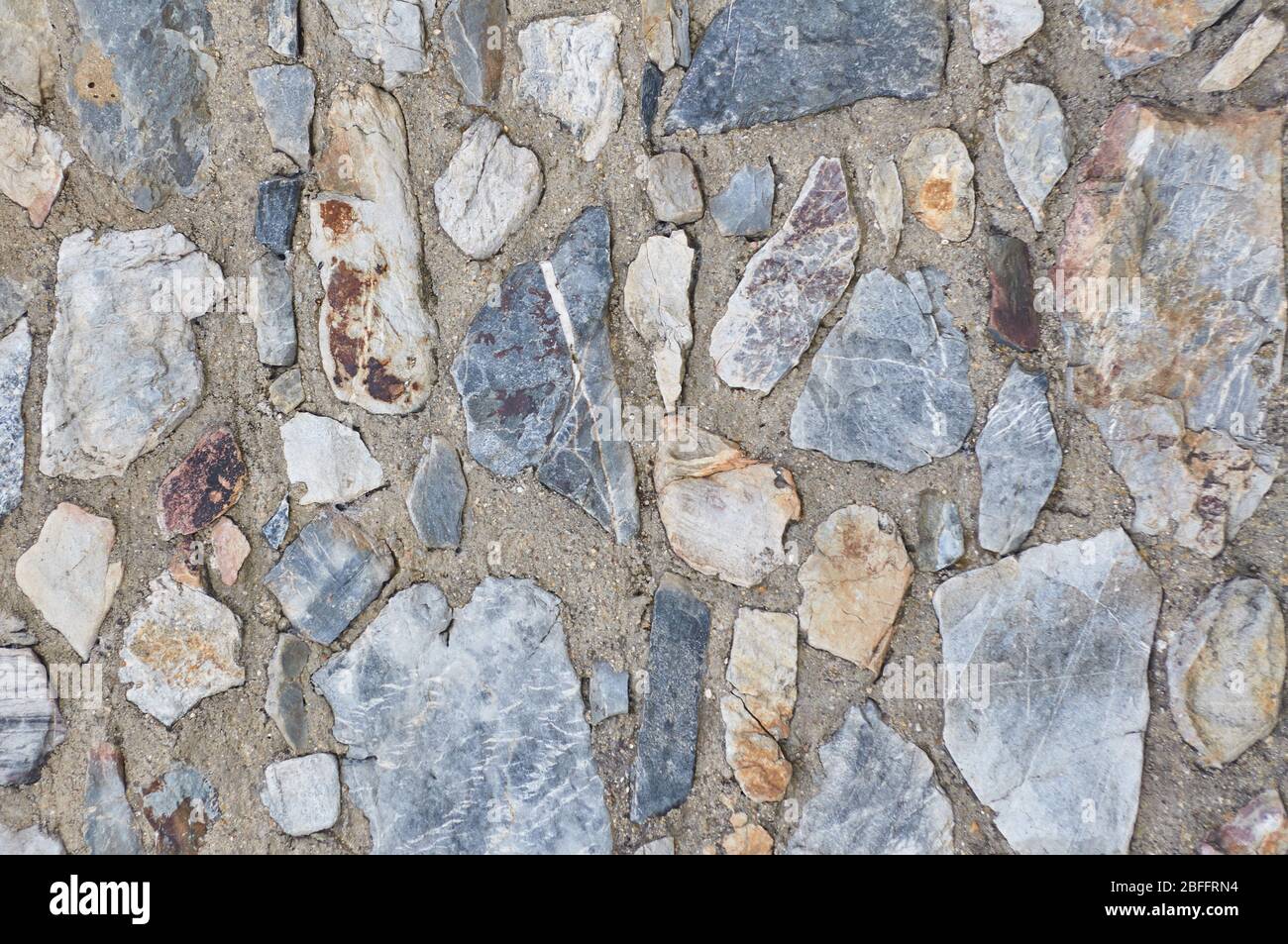 Photograph showing the detail of a stone wall corresponding to a house ...