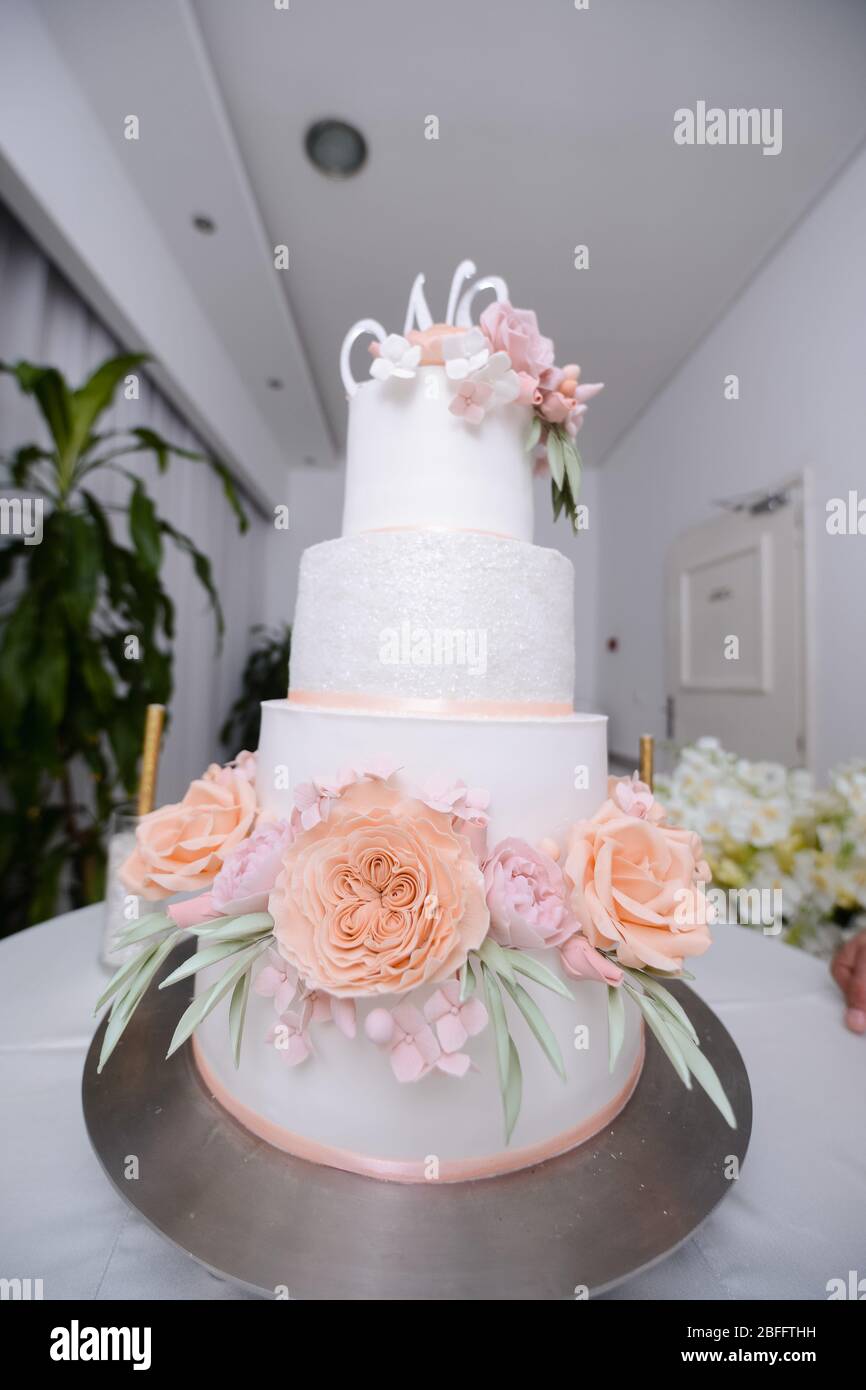 A beautiful big cake for a special event. Sweet table for special party ...