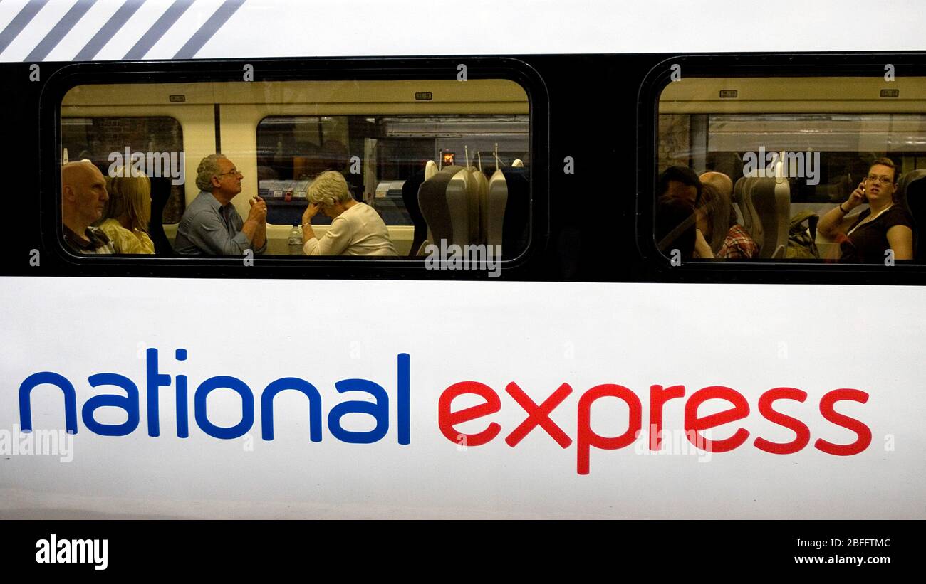 People on board a National Express train at Kings Cross station, London ...