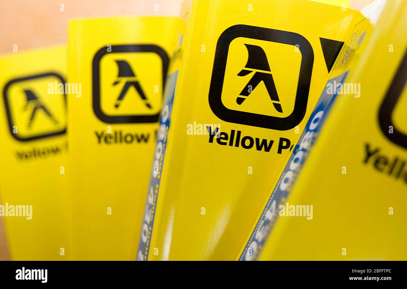 Illustrative image of Yellow Pages books Stock Photo - Alamy